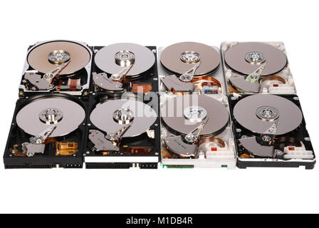 Many Open Hard drives isolated on white background. Are combined by a ...
