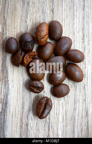 Raw beans on color background Stock Photo - Alamy