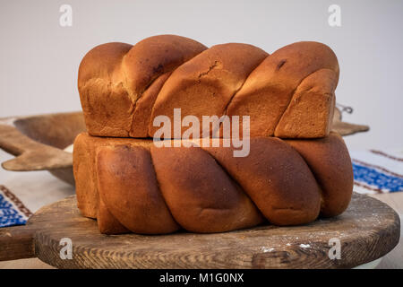 Slices of homemade traditional Romanian sweet bread. Loaf of bread on ...