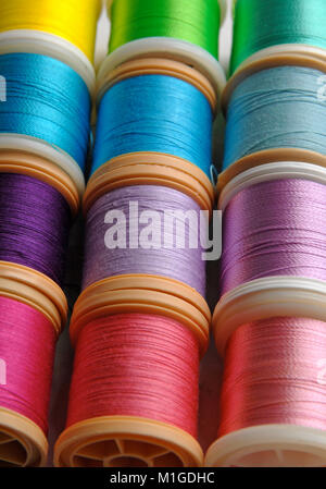 Reels of brightly coloured cotton Stock Photo - Alamy