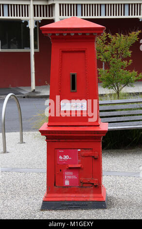 Red Australia Post mail box close up on a suburban Melbourne street ...