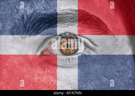 Human face painted with flag of Dominican Republic Stock Photo - Alamy