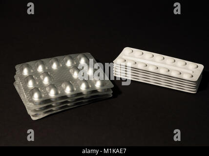 Pills tablets for lowering blood pressure isolated on a white ...