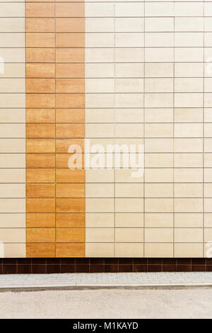 Modern beige metal facade tiles wall and a ground. Abstract ...
