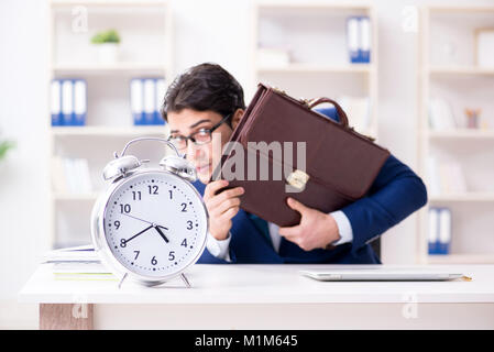 Businessman in rush trying to meet deadline Stock Photo - Alamy