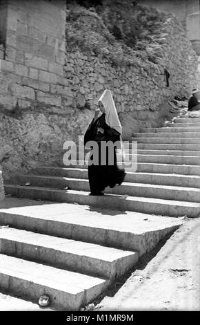 Muslim woman wearing Shatweh headdress in Palestine 1940 Stock Photo ...