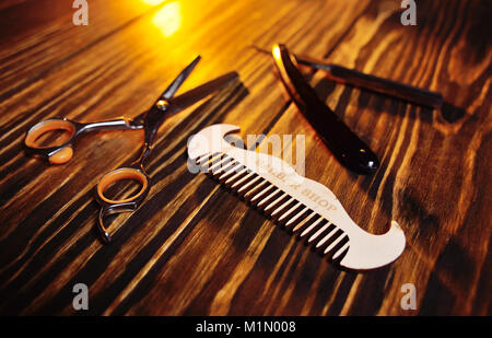 Vintage tools of barber shop on wooden background Stock Photo - Alamy