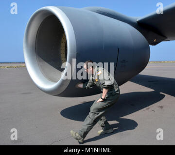 A pilot inspects a KC-135 Stratotanker assigned to the 340th ...