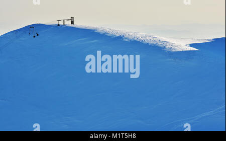 Beautiful evening winter view at 2000m altitude with traces slope in ...