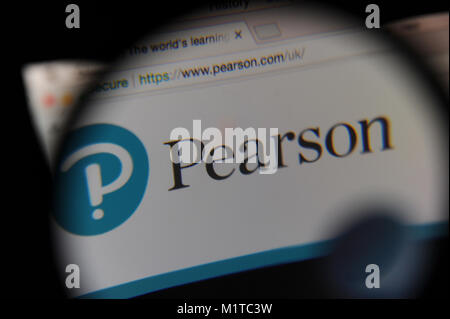 The Pearson website seen through a magnifying glass Stock Photo - Alamy