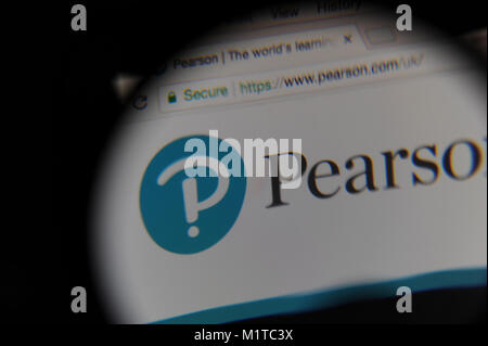 The Pearson website seen through a magnifying glass Stock Photo - Alamy