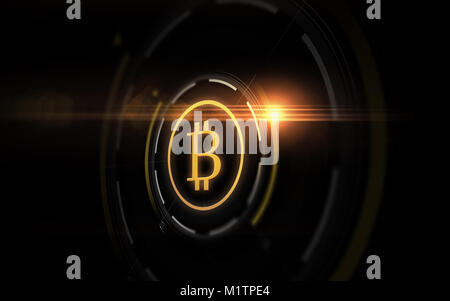 gold bitcoin projection over black background Stock Photo - Alamy