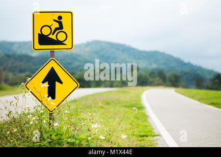 Traffic signs warning up to hill steep road sign to slope a steep climb ...