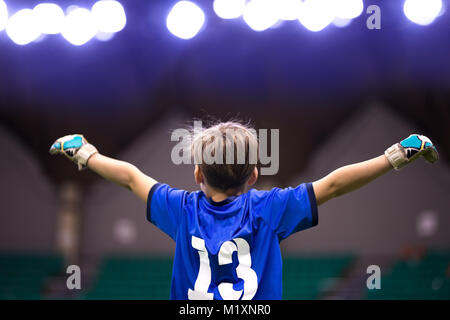 Kids celebrating sports success. Victory of children football team in tournament final game ...