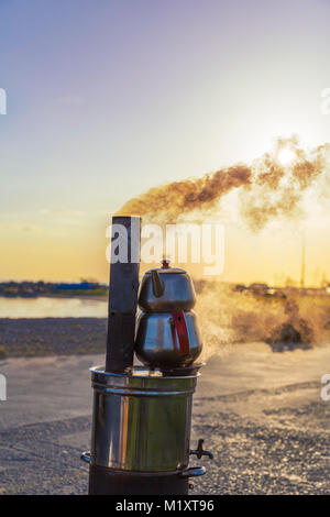 Traditional Turkish Tea Urn near the sea during the sunset Stock Photo ...