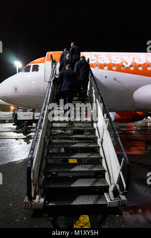 Night scene of passengers boarding an Easyjet aircraft at Glasgow ...