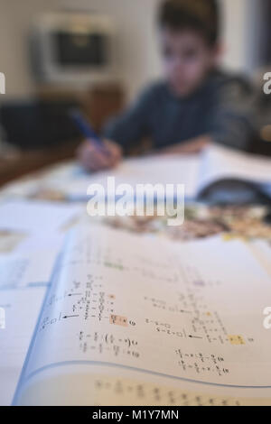 Child do his homework on mathematic Stock Photo - Alamy