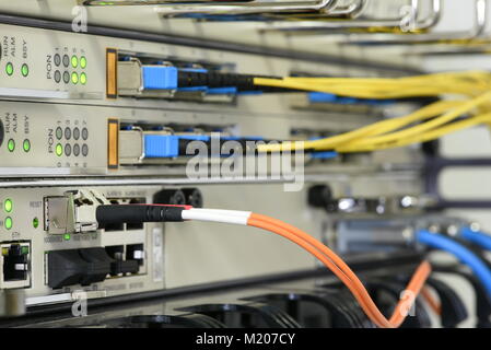 Network devices and optical cables in telecommunication system Stock ...