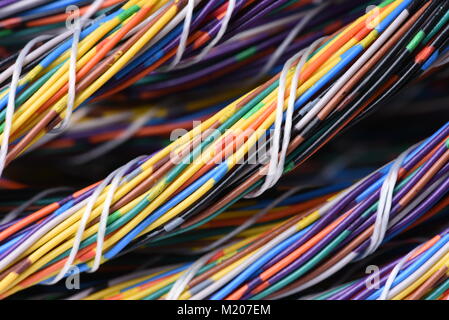 Bundle of colorful wires and cables closeup, used in telecommunication ...