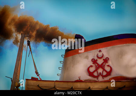 exhaust of ferry cause to air pollution Stock Photo - Alamy