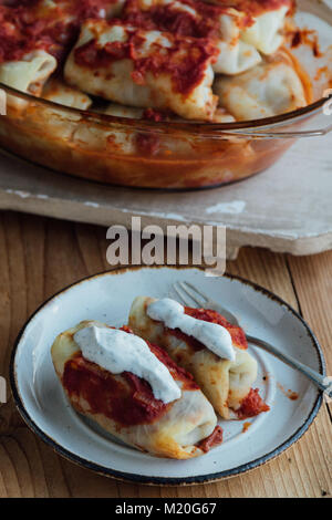 Stuffed Savoy Cabbage in Tomato Sauce Stock Photo - Alamy