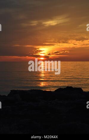 Golden sunset along Paphos seashore in Cyprus during November Stock ...