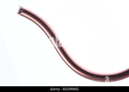 Copper wire isolated on white background Stock Photo - Alamy