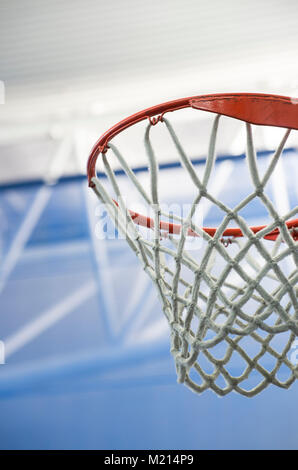A closeup of a basketball hoop and net on the stand outdoors Stock ...