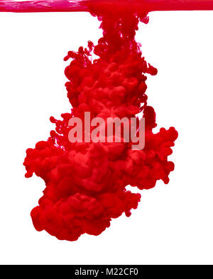 red color paint pouring in water Stock Photo - Alamy