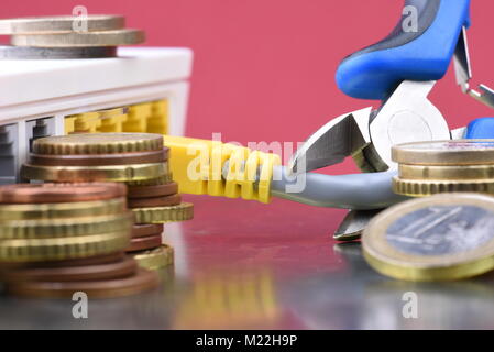 Coins and network router, paid access to the network Stock Photo - Alamy