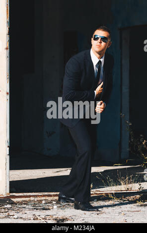 Handsome security guard in surveillance room Stock Photo - Alamy