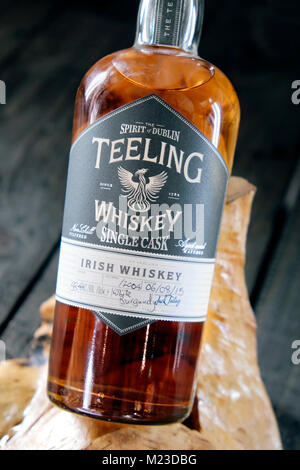 Irish Whiskey on Display vertical: A massive display case of identical ...