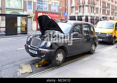 Broken down London taxi, UK Stock Photo - Alamy