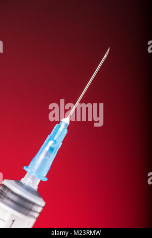 single use Medical syringe white dark background Stock Photo - Alamy
