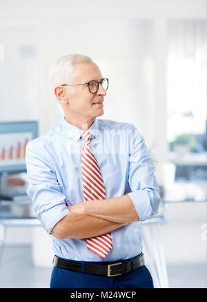 A senior sales manager businessman standing in the office Stock Photo ...