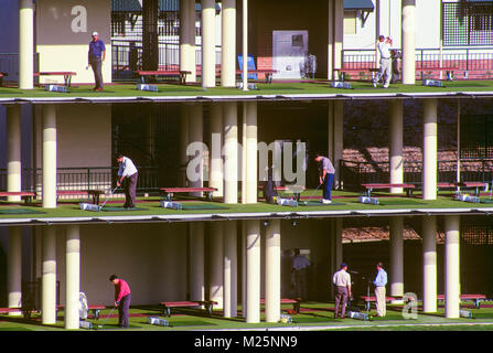 Golfers on the multi-level driving range at Moore Park Golf Course in ...