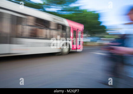 Metro bus speeding along the road at the El Malecon, Havana, Cuba, West ...