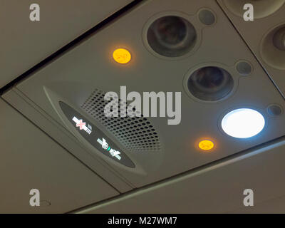 Plane cabin signs Stock Photo - Alamy