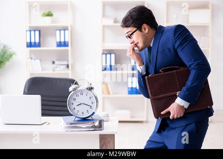 Businessman in rush trying to meet deadline Stock Photo - Alamy