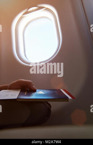 Passport with plane tickets, close-up, isolated Stock Photo - Alamy