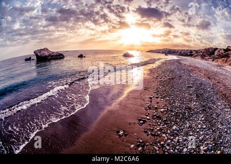 Seascape sunset near Petra tou Romiou. Paphos District, Cyprus Stock ...