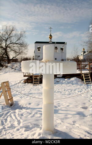 Ice cross in winter. Epiphany Orthodox holiday on a place of ice-hole ...