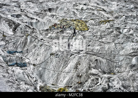 La Rinconada, Puno, Peru. 10th Sep, 2015. Miners walking down a street ...