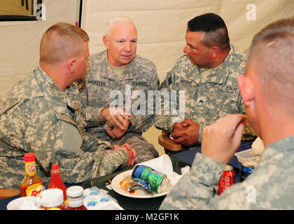 Lt. Gen. William G. Webster, the commanding general of Third Army, cuts ...