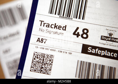 A Royal Mail Tracked 48 label on an Amazon box Stock Photo - Alamy
