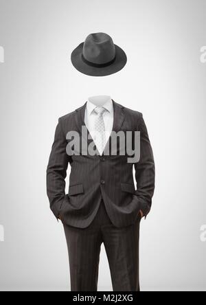 Headless man with surreal floating hat and balloons in front of sky ...