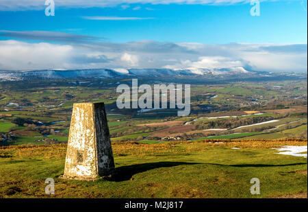 Trig point (triangulation pillar) on the ancient Iron Age Hill Fort of ...