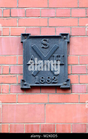London, England, UK. Fire insurance plaques / fire marks on a wall in ...
