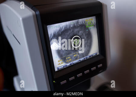 Auto-Ref-Keratometer display with an eye on it Stock Photo - Alamy