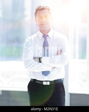 Photo of serious bristly man on gray background Stock Photo - Alamy